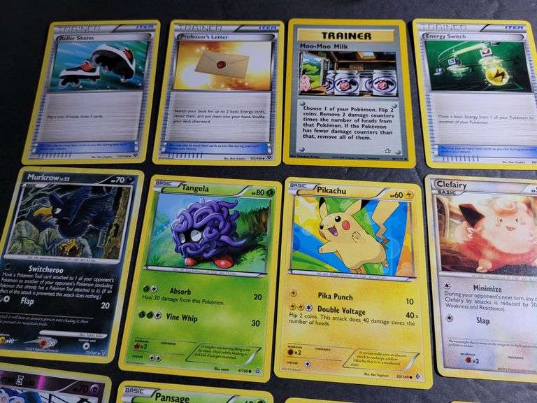 24 Pokémon Cards - Auction Ohio