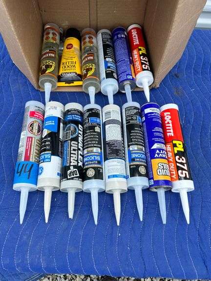 Box of Assorted Caulk, Adhesives, and Sealants - Auction Ohio