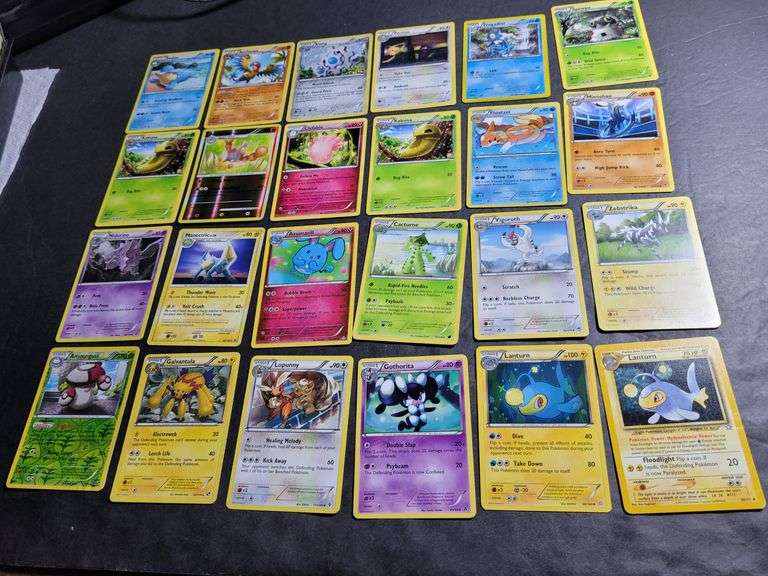 24 Pokémon Cards - Auction Ohio