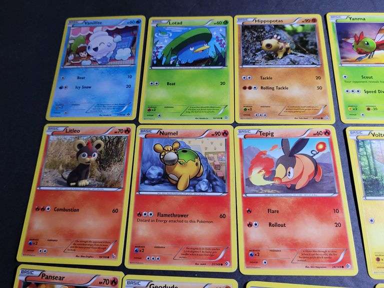 24 Pokémon Cards - Auction Ohio