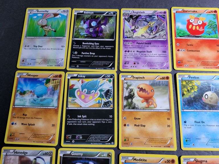 24 Pokémon Cards - Auction Ohio