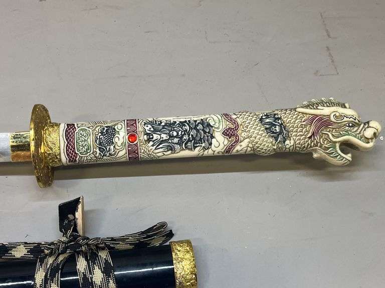 Decorative Sword With Dragon Motif Handle and Black Scabbard - Auction Ohio