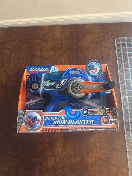 Rapid Fire Spin Blaster NEW IN BOX - Auction Ohio
