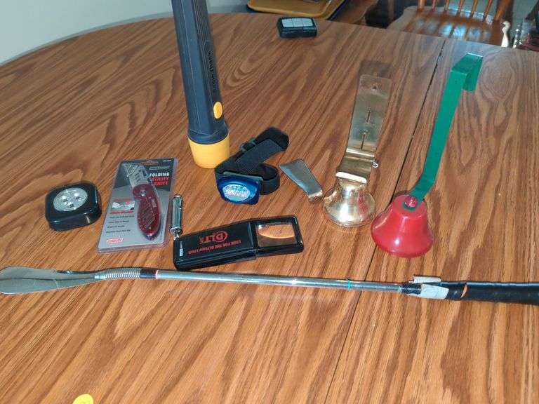 Bells, Utility Knives, Head Lights and More - Auction Ohio