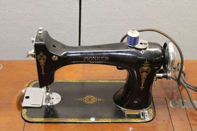 Pioneer Rotary Sewing Machine in Wooden Table Cabinet - Auction Ohio