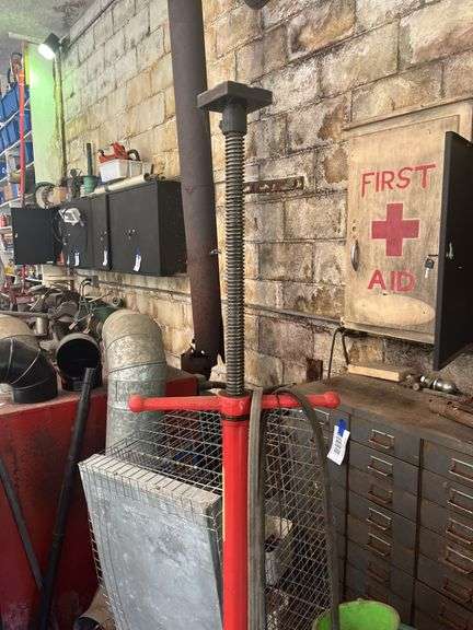 Red Screw-Type Metal Stand with Adjustable Mechanism - Auction Ohio