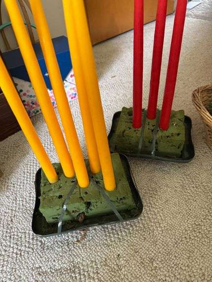 Red and Yellow Tapers with Floral Foam and Basket Holders - Auction Ohio