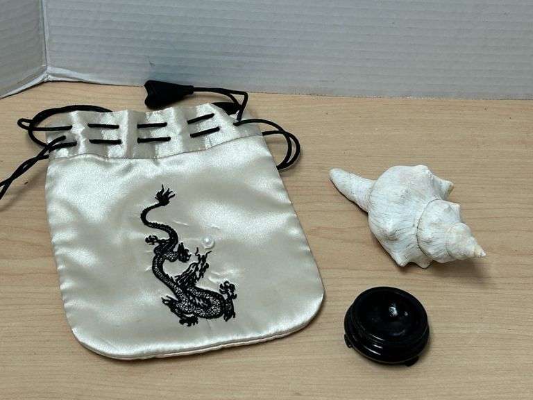 Dragon Embroidered Pouch, Shell, and Display Stand - Auction Ohio