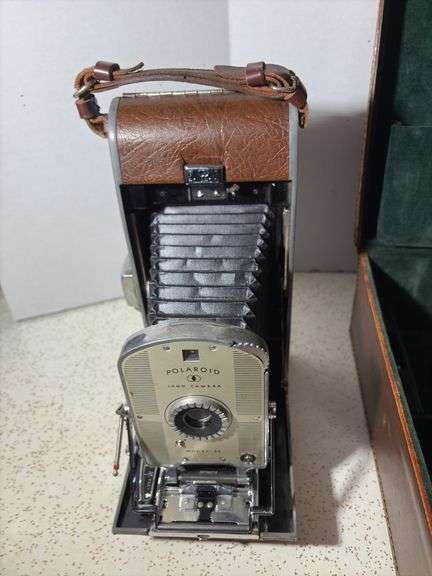 2 Polaroid Fold Out Camera in Cases - Auction Ohio