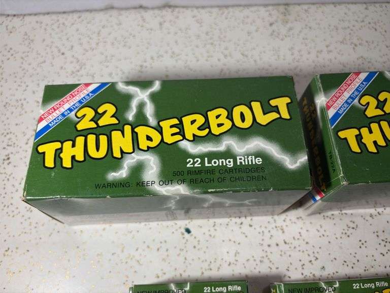 Two Bricks and Four Boxes 22 Long Rifle Shells - Auction Ohio