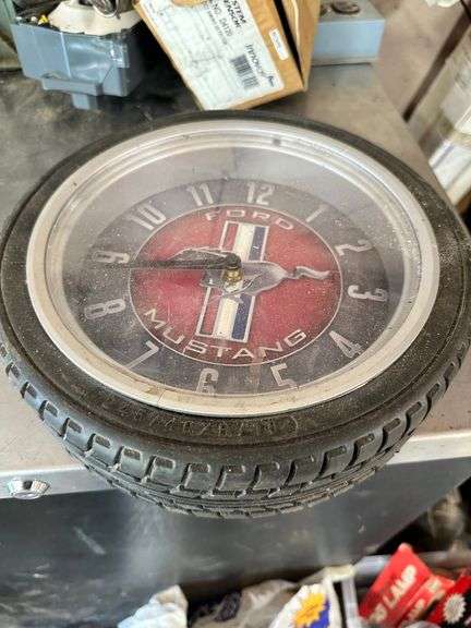 Ford Mustang wall clock with tire-style frame - Auction Ohio