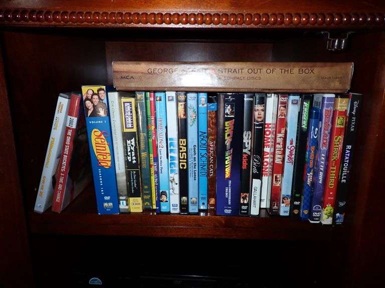 Stack of Adult owned DVDs BluRay, & Music. - Auction Ohio