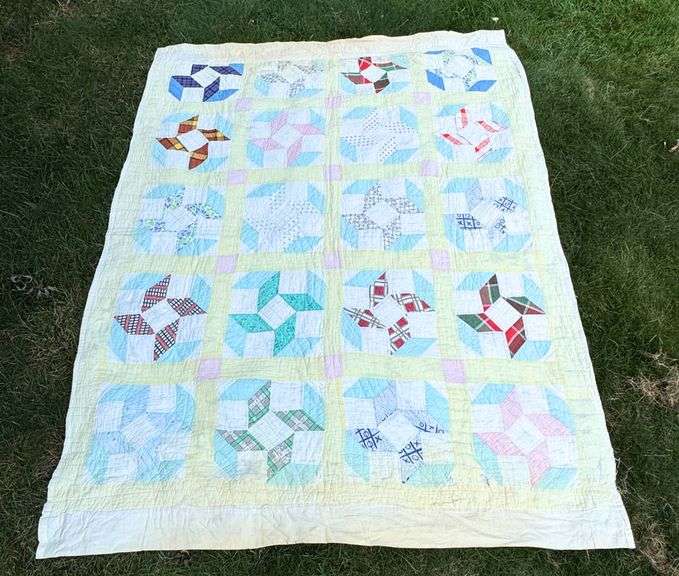 Handmade Patchwork Quilt with Geometric and Pinwheel Patterns - Auction Ohio