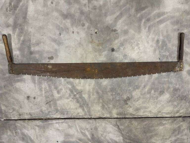 Vintage two-man saw - Auction Ohio