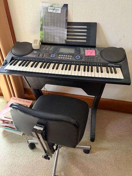 RadioShack Electric Keyboard with 61 keys. - Auction Ohio