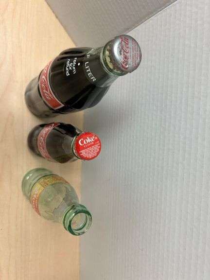 Trio of Coca-Cola Bottles – Two Full, One Empty - Auction Ohio