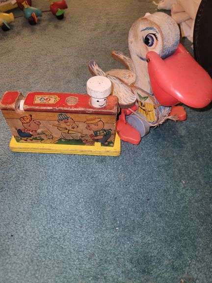 1960s Fisher Price Big Bill Pelican Toy & Pound and Saw Toy - Auction Ohio