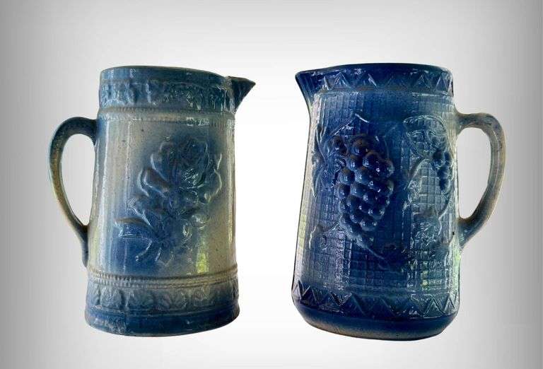 Two Vintage Salt Glazed Relief-Decorated Pottery Pitchers - Auction Ohio