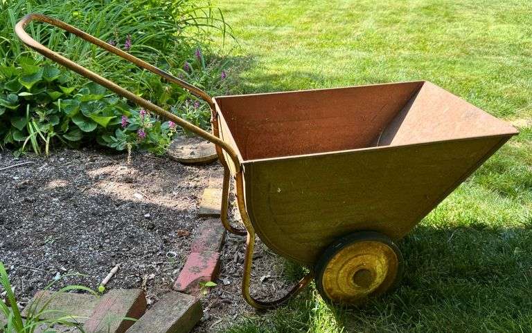 Rustic Metal Wheelbarrow with Single Wheel and Long Handle - Auction Ohio
