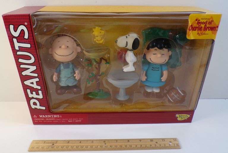 New in Box " Peanut" Action Figures. - Auction Ohio
