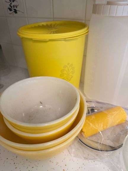 Yellow Tupperware and Clear Glass Kitchen Items - Auction Ohio
