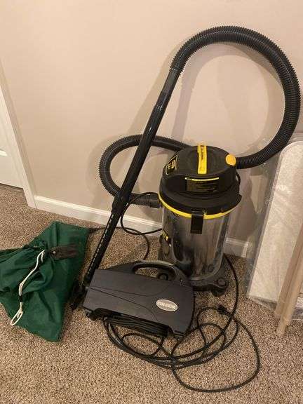 Stanley Wet/Dry vac and Oreck compact canister vac with attachments ...