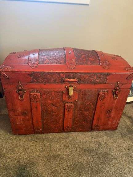 Unusual red antique hump back trunk - Auction Ohio