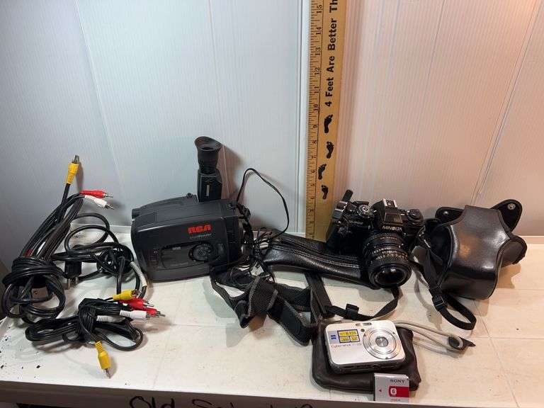 RCA Small Wonder VHS Playback, Nikon Camera, Etc. - Auction Ohio