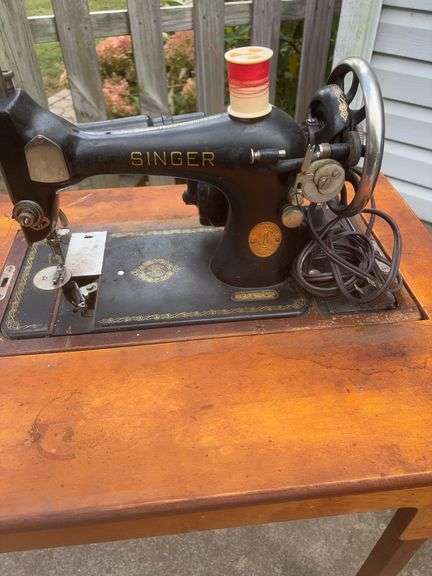 Singer sewing machine model AE887709 - Auction Ohio