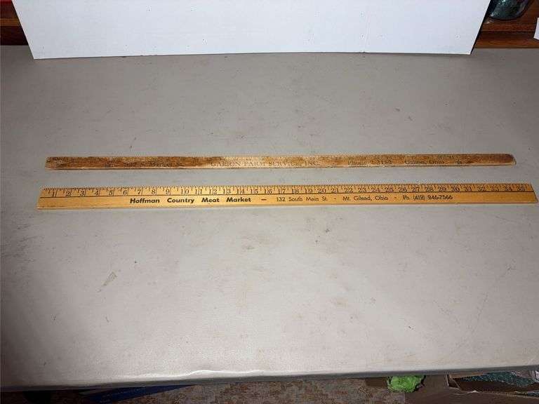 2 Yard Sticks - Auction Ohio
