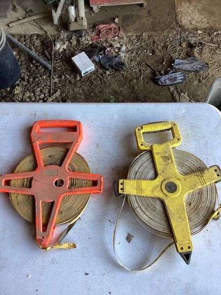Two open reel fiberglass measuring tapes - Auction Ohio