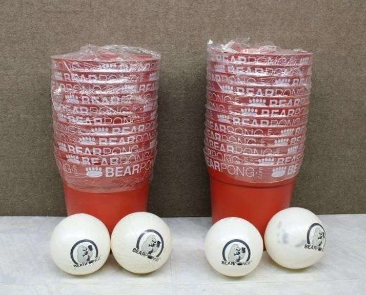 23 Bear Pong Cups and 4 Inflatable Balls - Auction Ohio