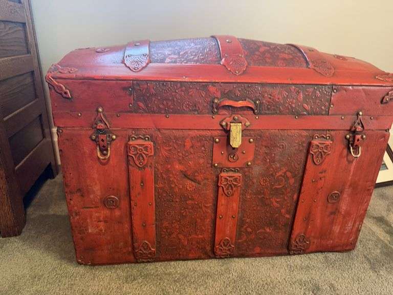 Unusual red antique hump back trunk - Auction Ohio