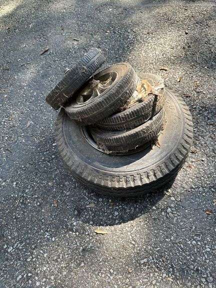 Set of Small Rubber Tires with Metal Rims - Auction Ohio