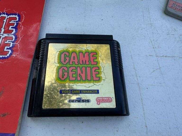 Game Genie for Sega Genesis with Manual - Auction Ohio