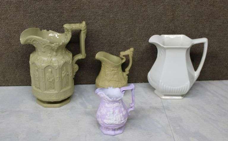 Four Ceramic Pitchers, Including Relief Decorated and Ironstone Designs ...