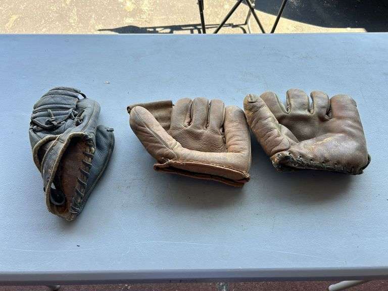 Three Vintage Leather Baseball Gloves - Auction Ohio
