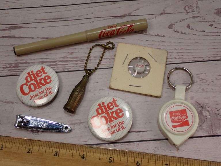 Coca-Cola Promotional Items Including Pins, Keychain, and Pen - Auction ...