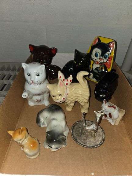 Cats, giraffe - Auction Ohio