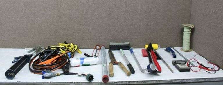 Tools and Accessories Including Jumper Cables, Multimeter, and Hand ...