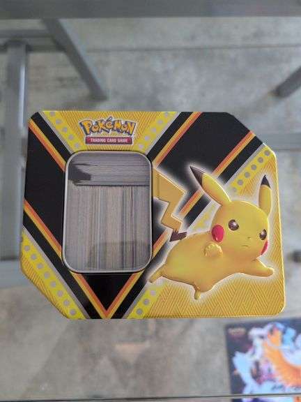 Pokemon Trading Cards in Pikachu Storage Tin - Auction Ohio