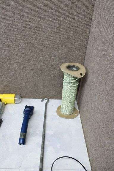 Tools and Accessories Including Jumper Cables, Multimeter, and Hand ...