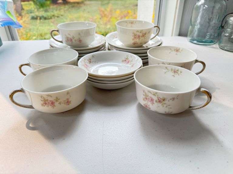 Porcelain Tea Cups and Saucers with Floral Design - Auction Ohio