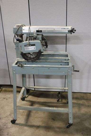 Delta Model 10 Deluxe Radial Arm Saw With Automatic Brake - Auction Ohio