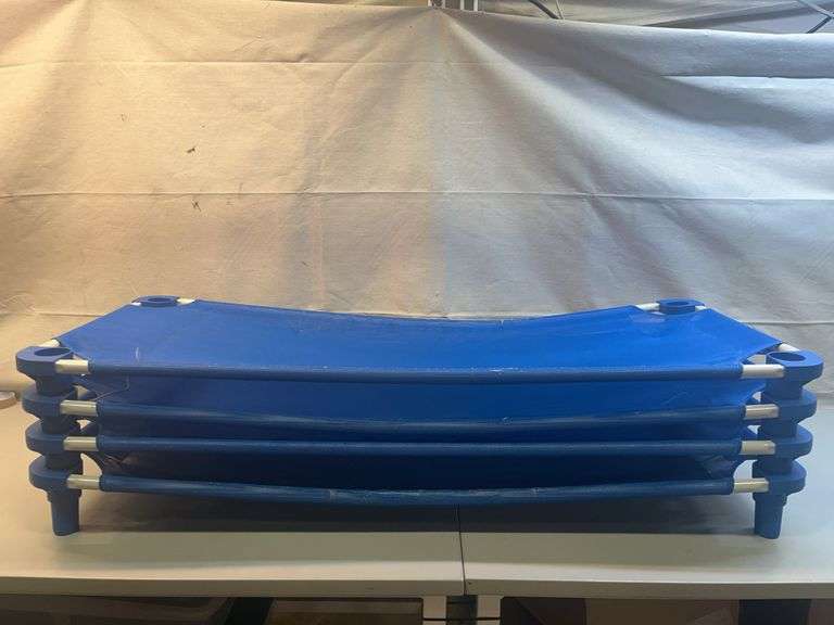 4 Blue Stackable Children’s Cots with Metal and Plastic Frame - Auction ...