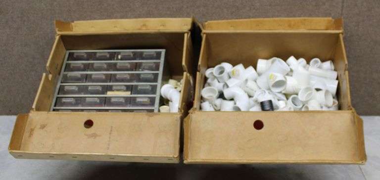 Two Boxes Containing Assorted PVC Pipe Fittings and Metal Drawer Parts ...