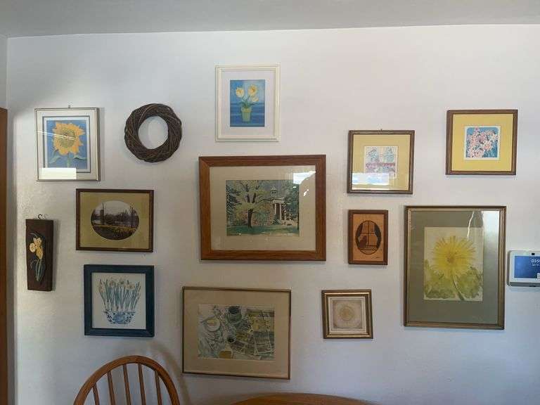 Wall Art Collection Featuring Framed Artwork and Decorative Items ...