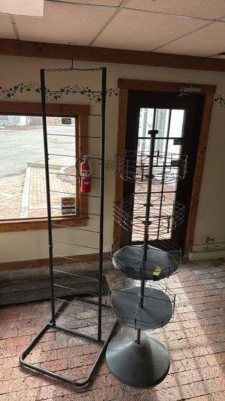 Two Black Wire Display Racks with Circular and Vertical Designs ...