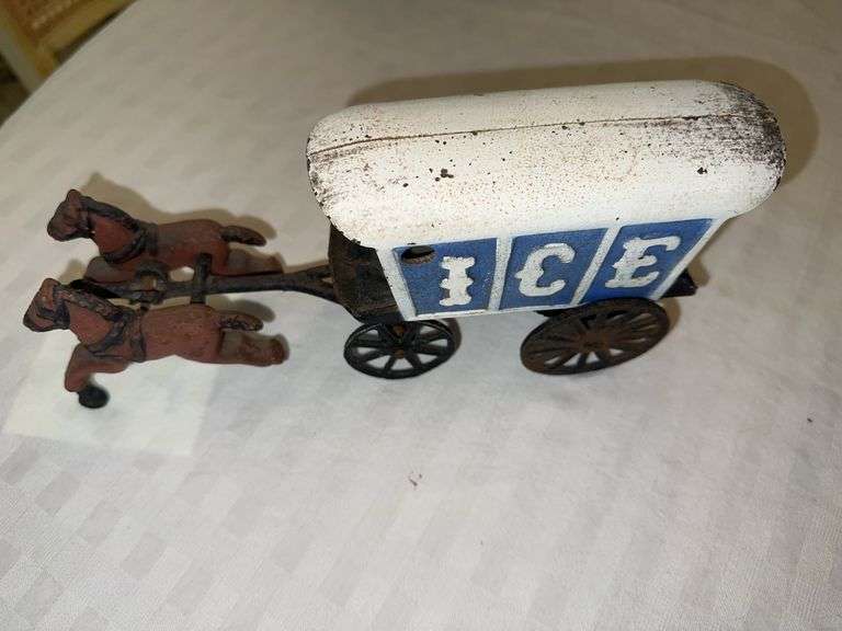 Vintage cast iron ice truck with horses - Auction Ohio