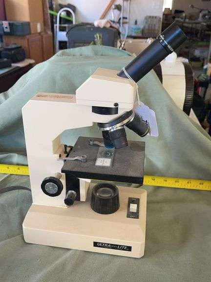 Swift M3200 Ultra Lite Microscope - Apexx Auctions